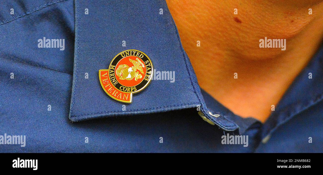 Marine veteran Shane Parris proudly displays his Marine Corps. pin as ...