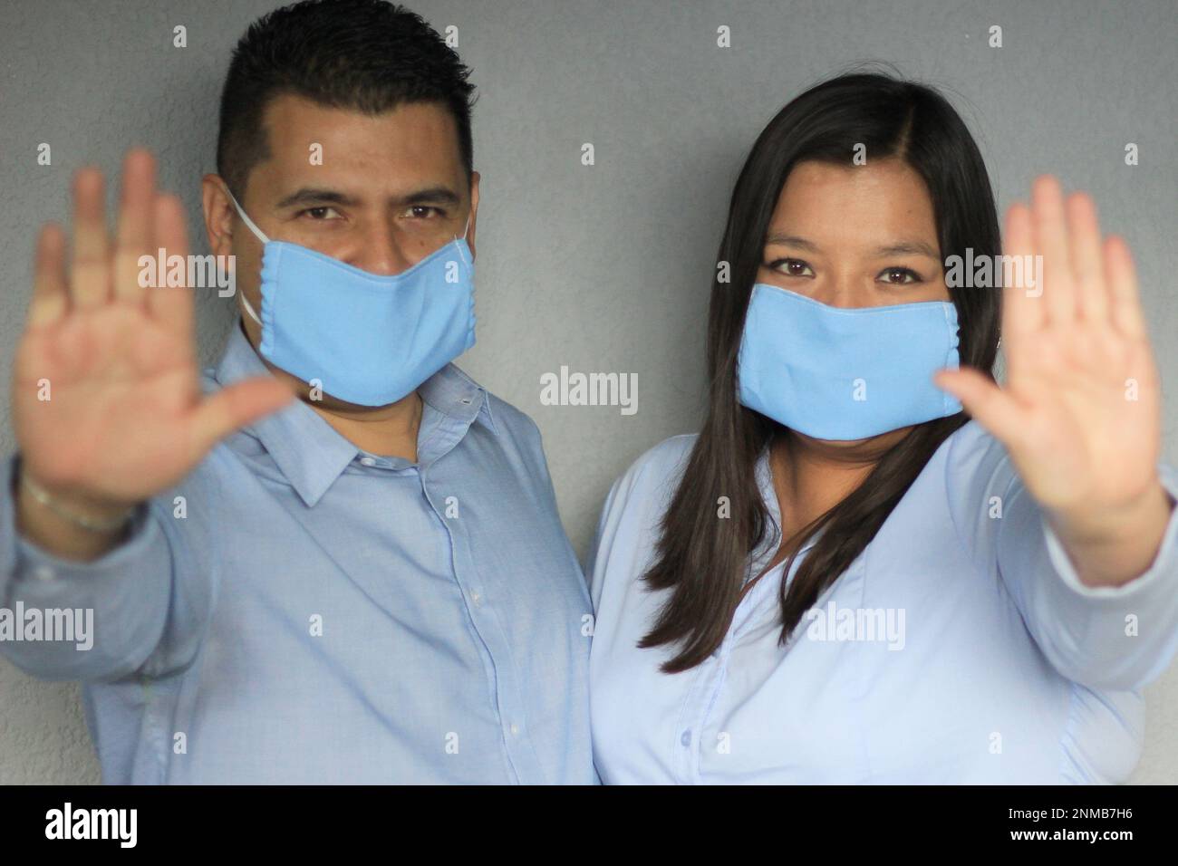 Latin couple with protection mask clinical use by covid-19 new normal ...