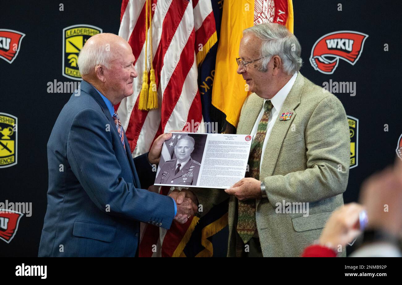 Greg Lowe, right, introduces his friend U.S. Army Lt. Col. Bill Pearson ...