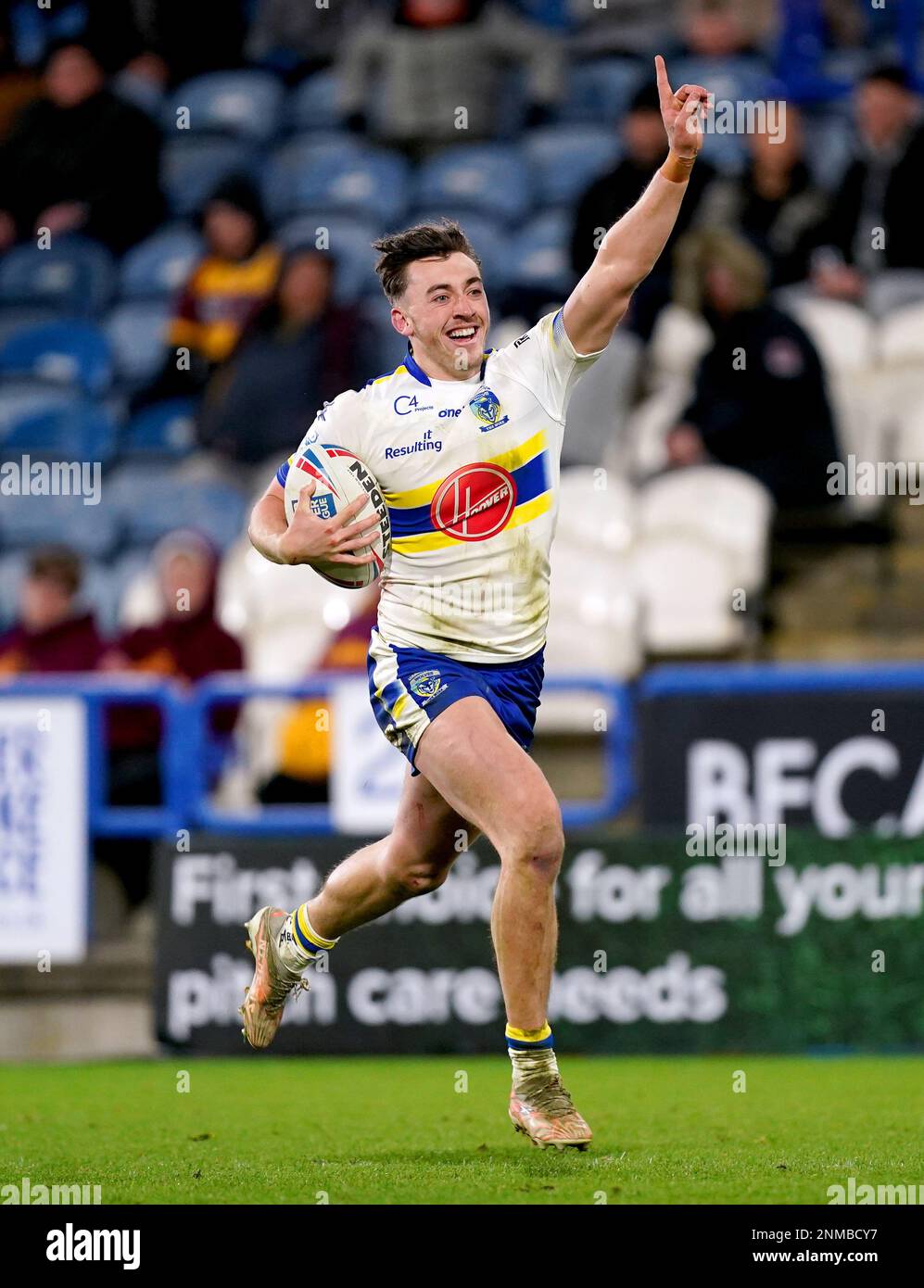 Warrington Wolves' Matty Ashton on his way to score his side's fourth ...