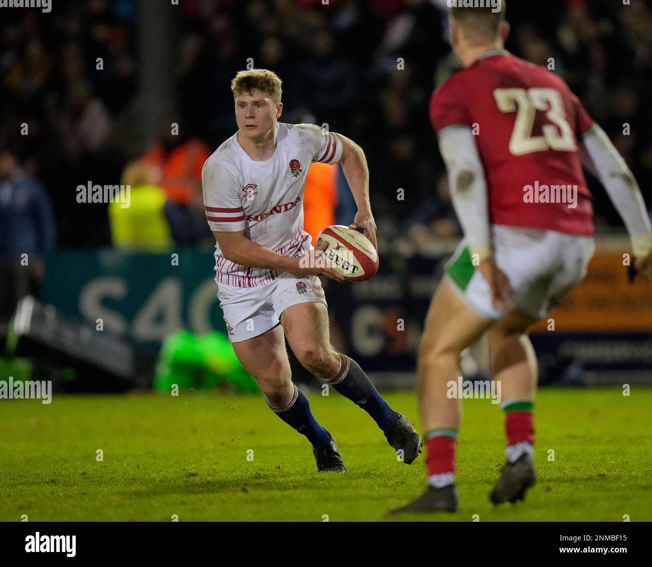 Joe Woodward of England U20's runs at the Wales U20's defence during ...
