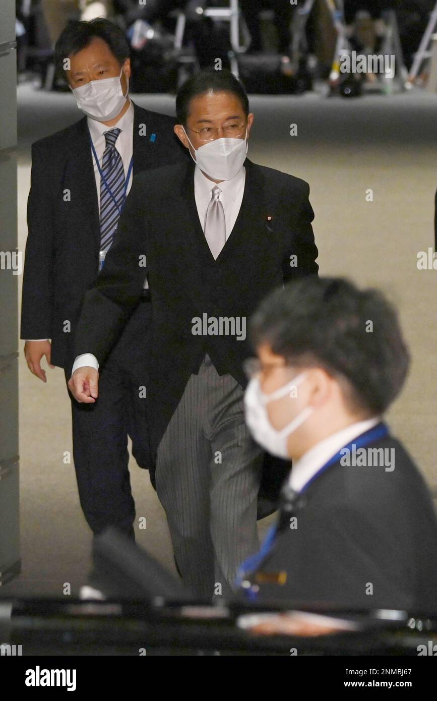 Prime Minister Fumio Kishida (C) arrives at the prime minister's office ...