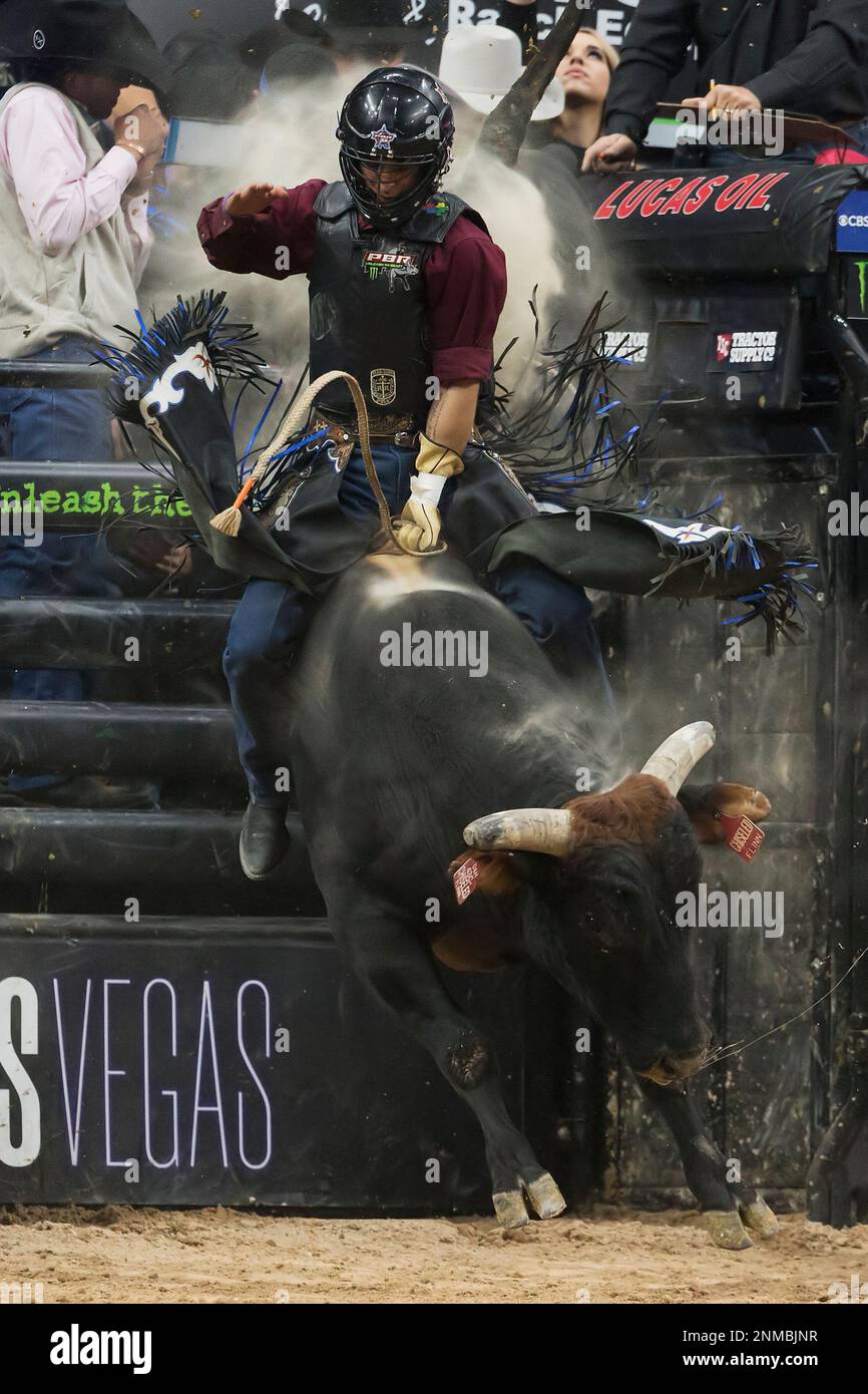 LAS VEGAS, NV - NOVEMBER 07: Mauricio Moreira rides bull Chiseled ...