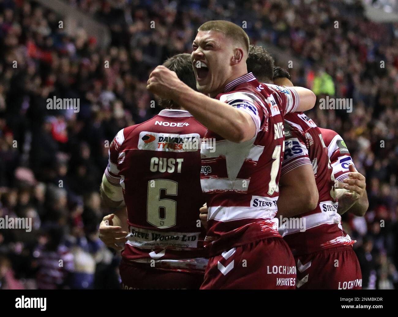 Wigan Warriors' Morgan Smithies celebrates the try of team-mate Sam ...