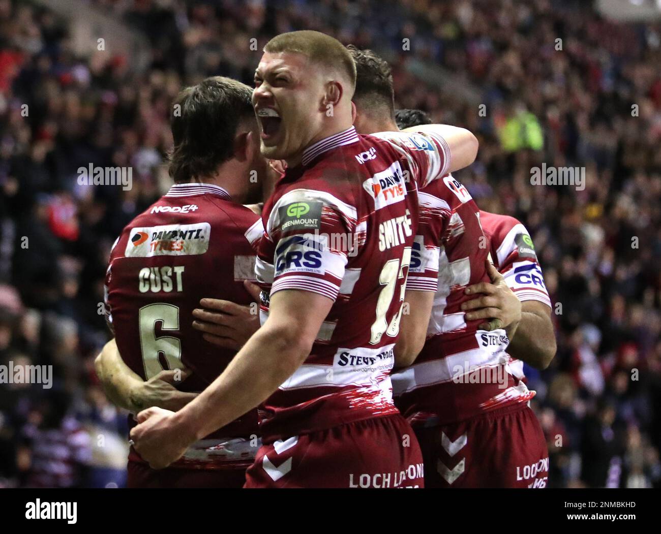 Wigan Warriors' Morgan Smithies celebrates the try of team-mate Sam ...