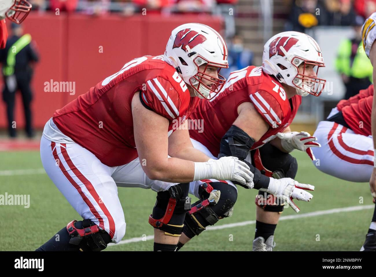 Wisconsin Badgers offensive linemen Logan Bruss (60) and Jack Nelson ...