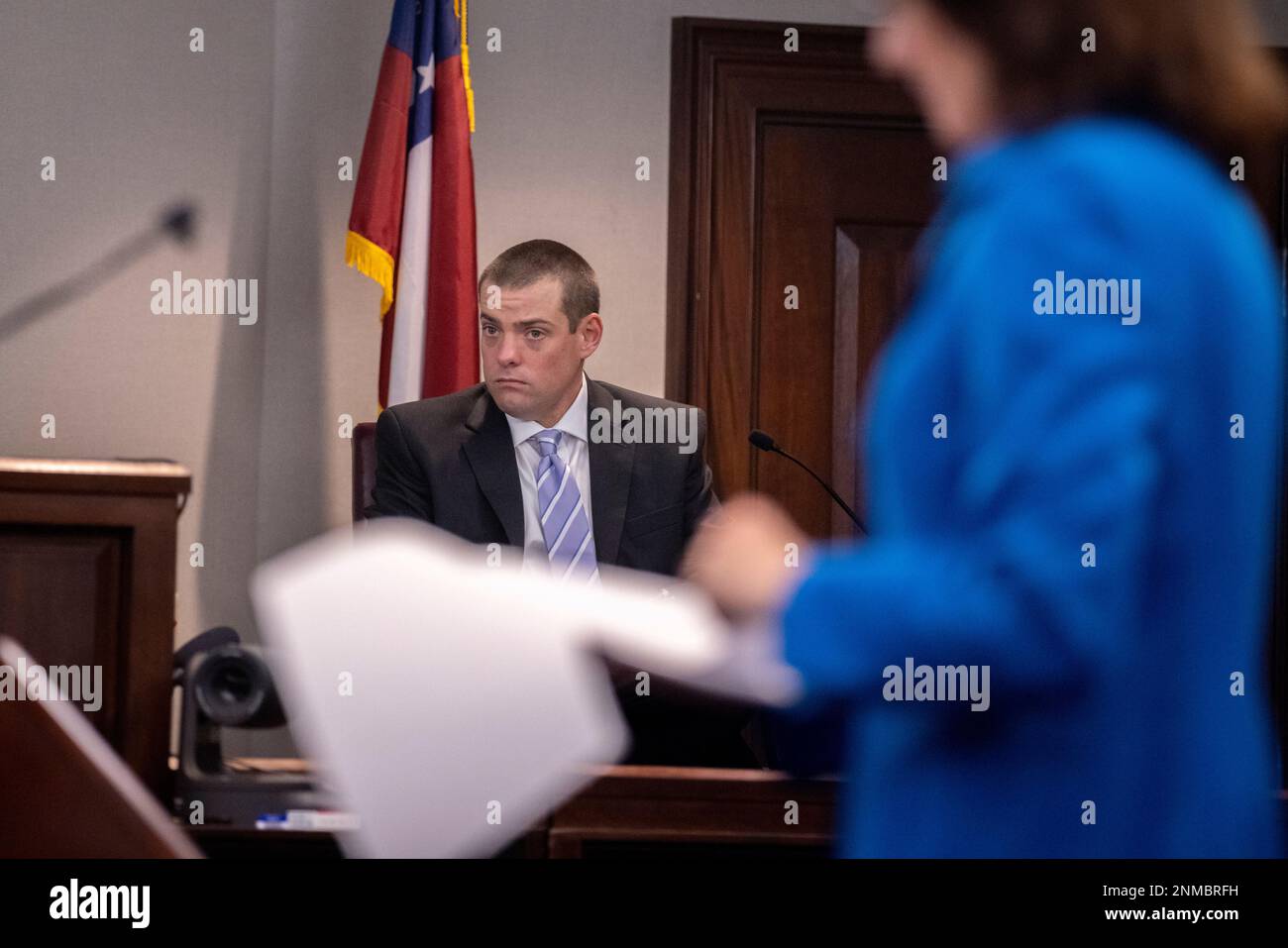 Glynn County Police Officer Jeff Brandeberry sits on the witness stand ...