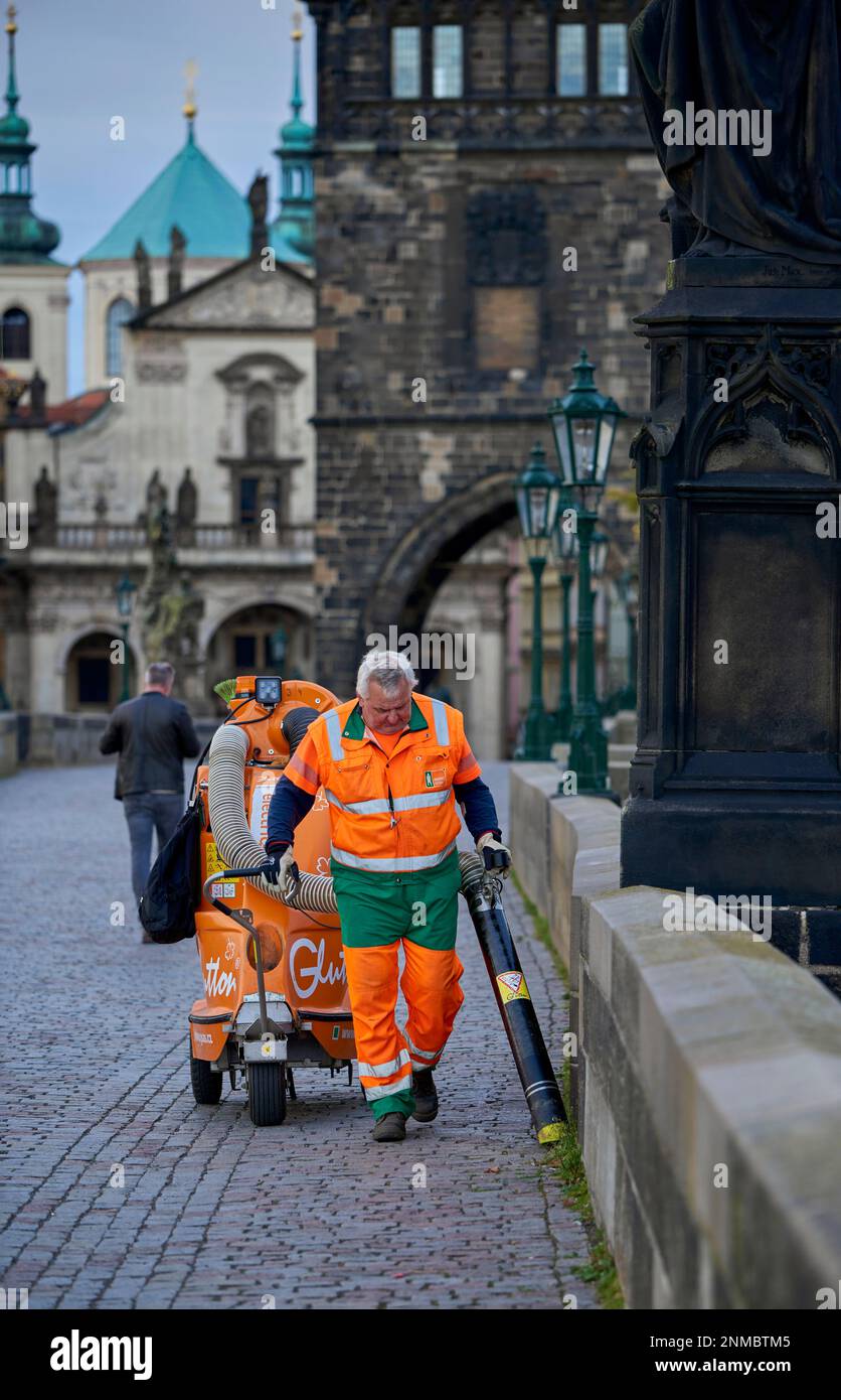 Municipality cleaning service at Charles Bridge early in the morning in ...