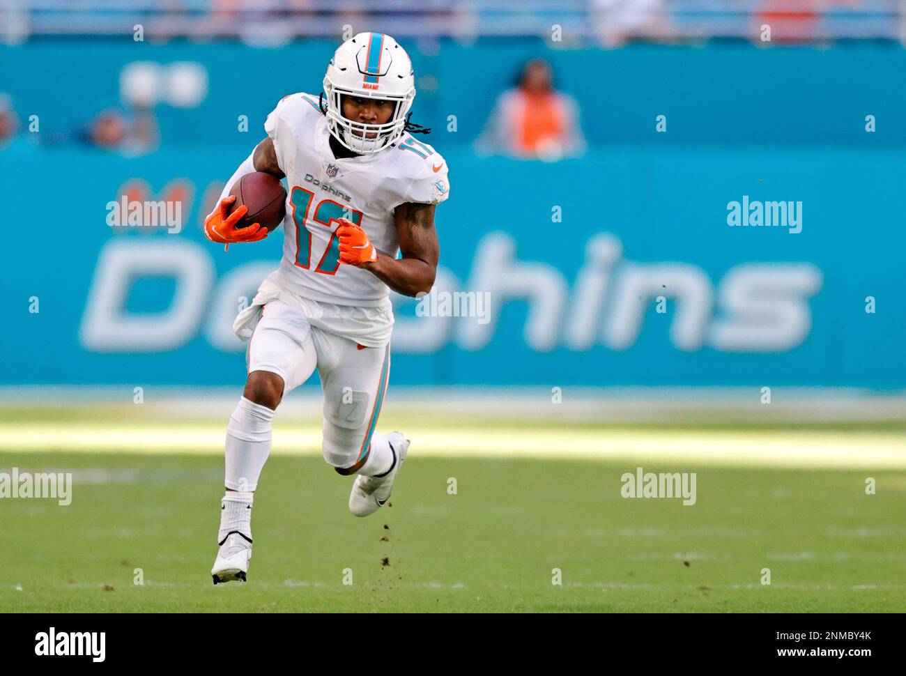 Miami Dolphins wide receiver Jaylen Waddle (17) runs with the football ...