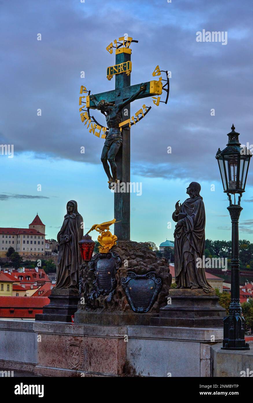 Statues at Charles Bridge in Prague early in the morning Stock Photo ...