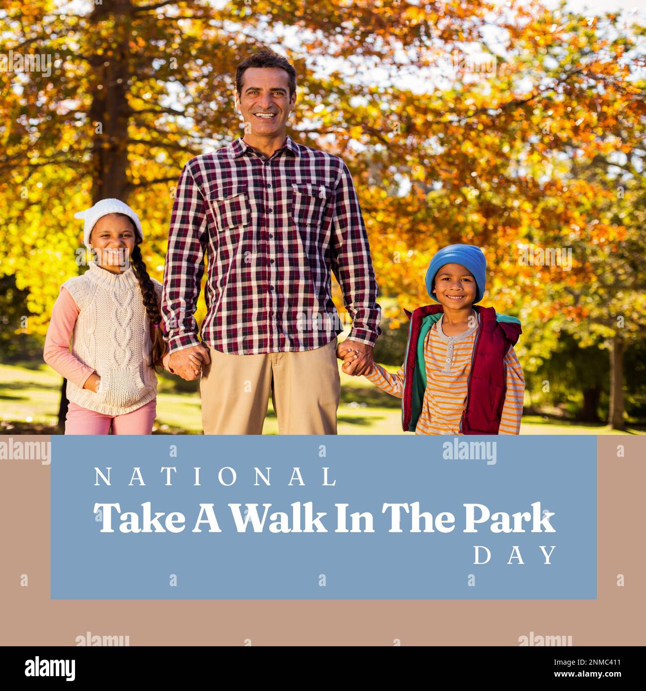 National take a walk in the park day text over happy diverse father ...