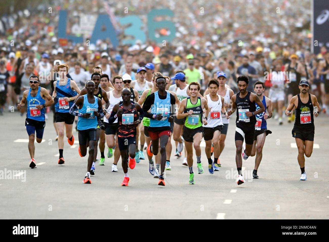 Elite men lead the race from Dodger Stadium at the start of the Los ...