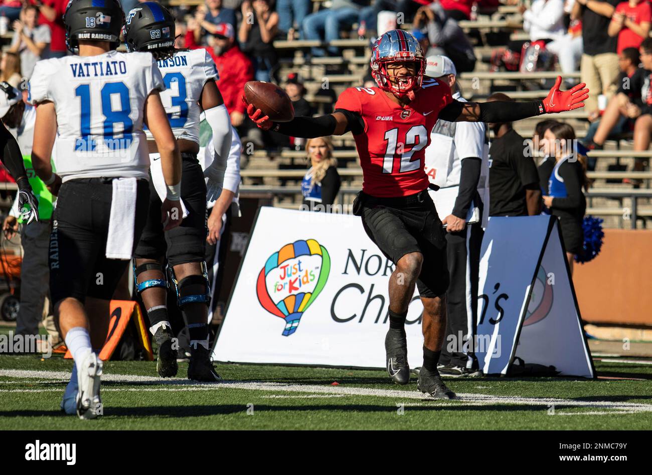 Western Kentucky defensive back Kahlef Hailassie (12) celebrates ...