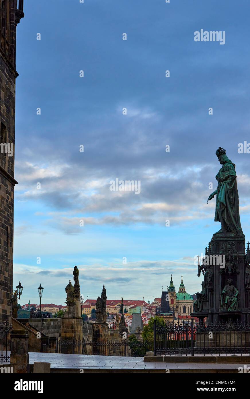 Statues at Charles Bridge in Prague early in the morning Stock Photo ...