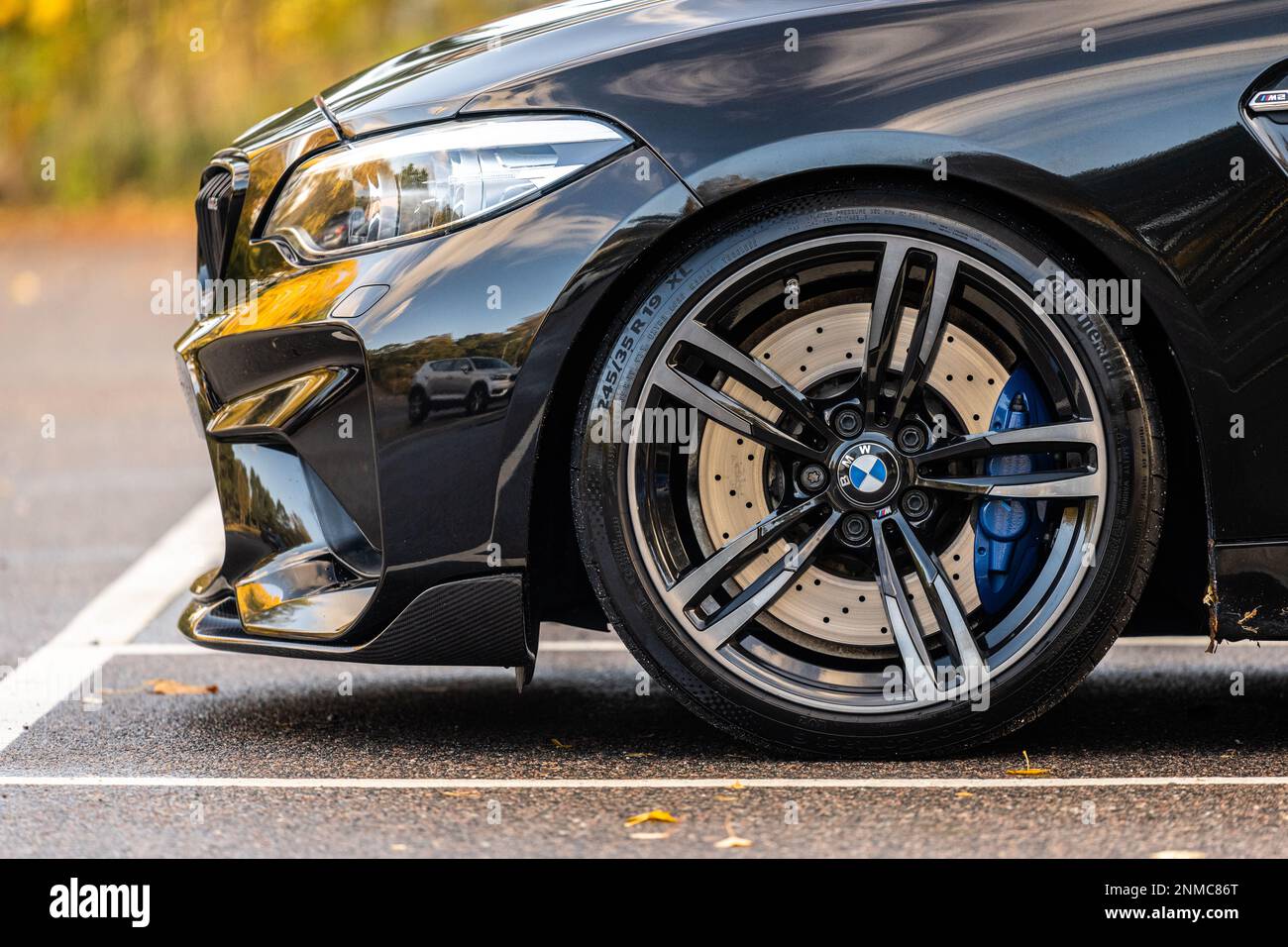 Gothenburg, Sweden - October 16 2022: Front left wheel of a black BMW ...