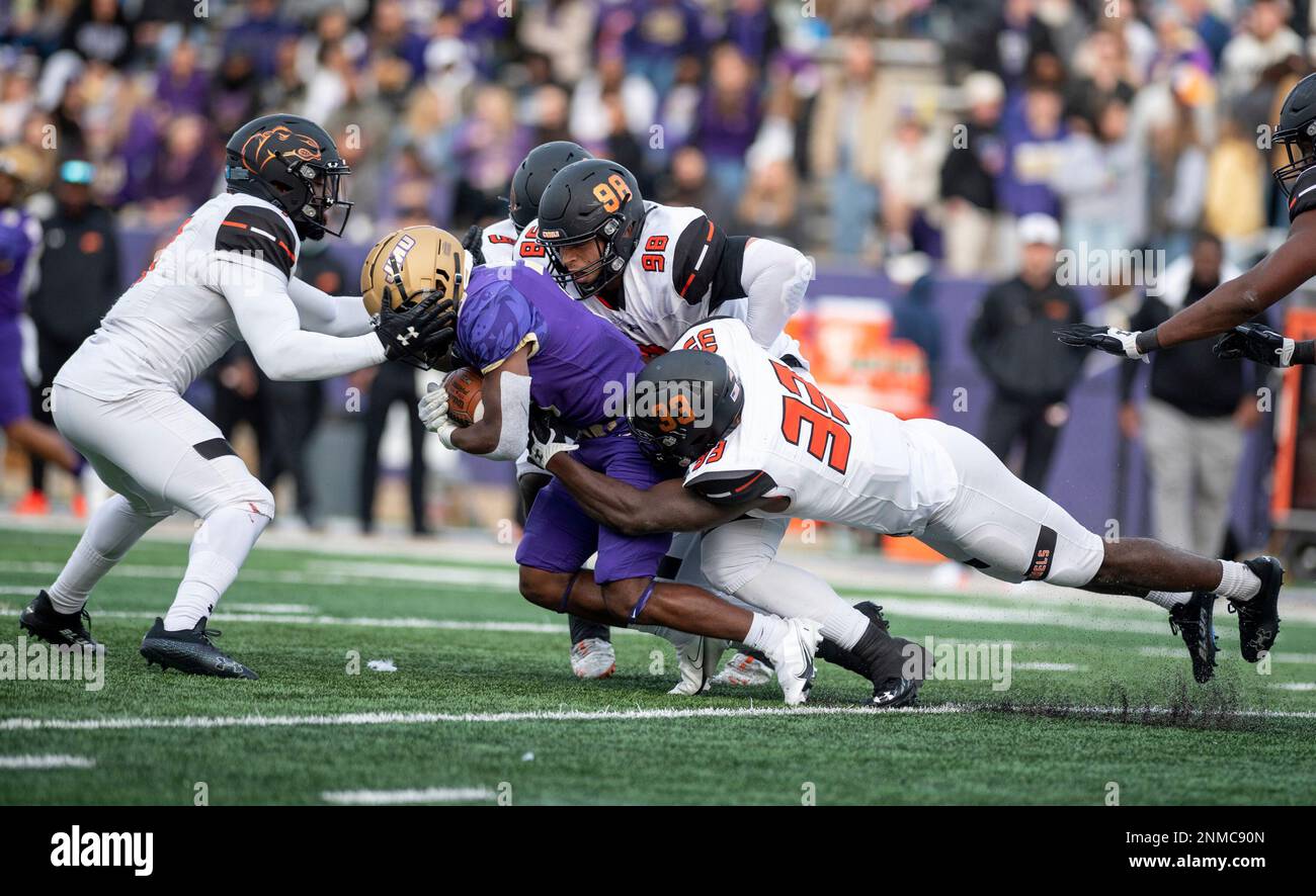 James Madison running back Solomon Vanhorse (3) is brought down by a ...