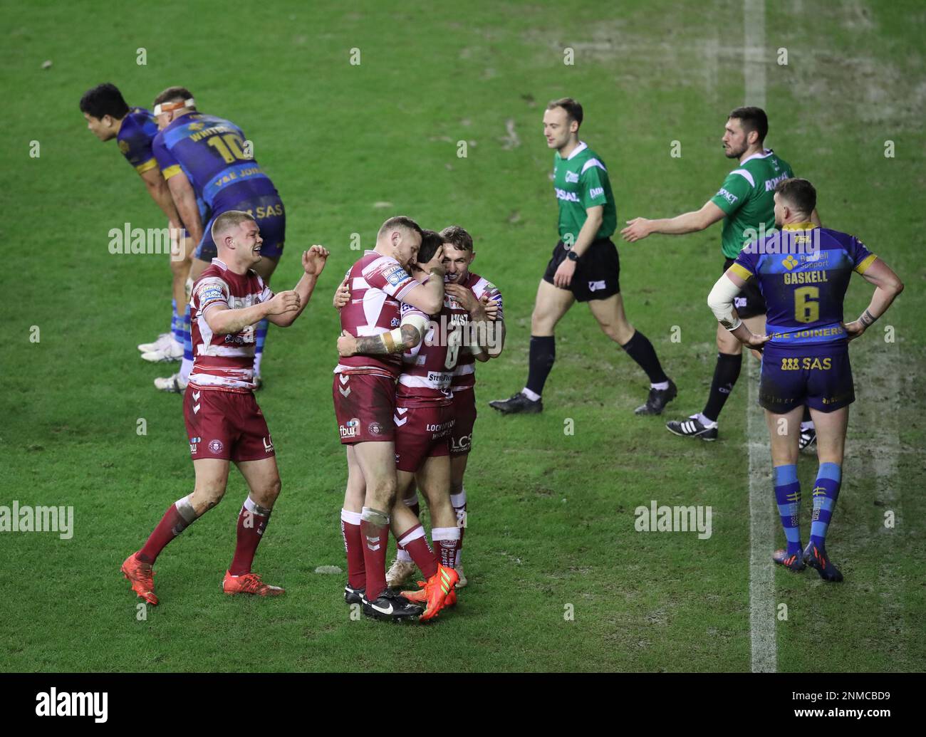Wigan Warriors' Cade Cust celebrates scoring their side's eleventh try ...
