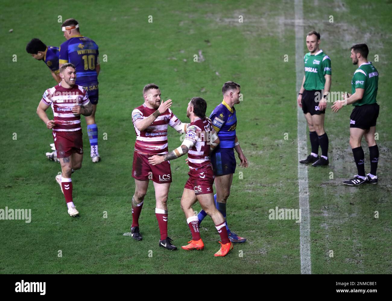 Wigan Warriors' Cade Cust celebrates scoring their side's eleventh try ...