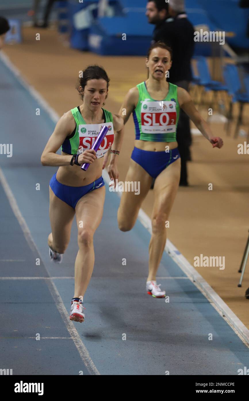 ISTANBUL, TURKEY - MARCH 05, 2022: Athletes running 4x400 metres relay ...