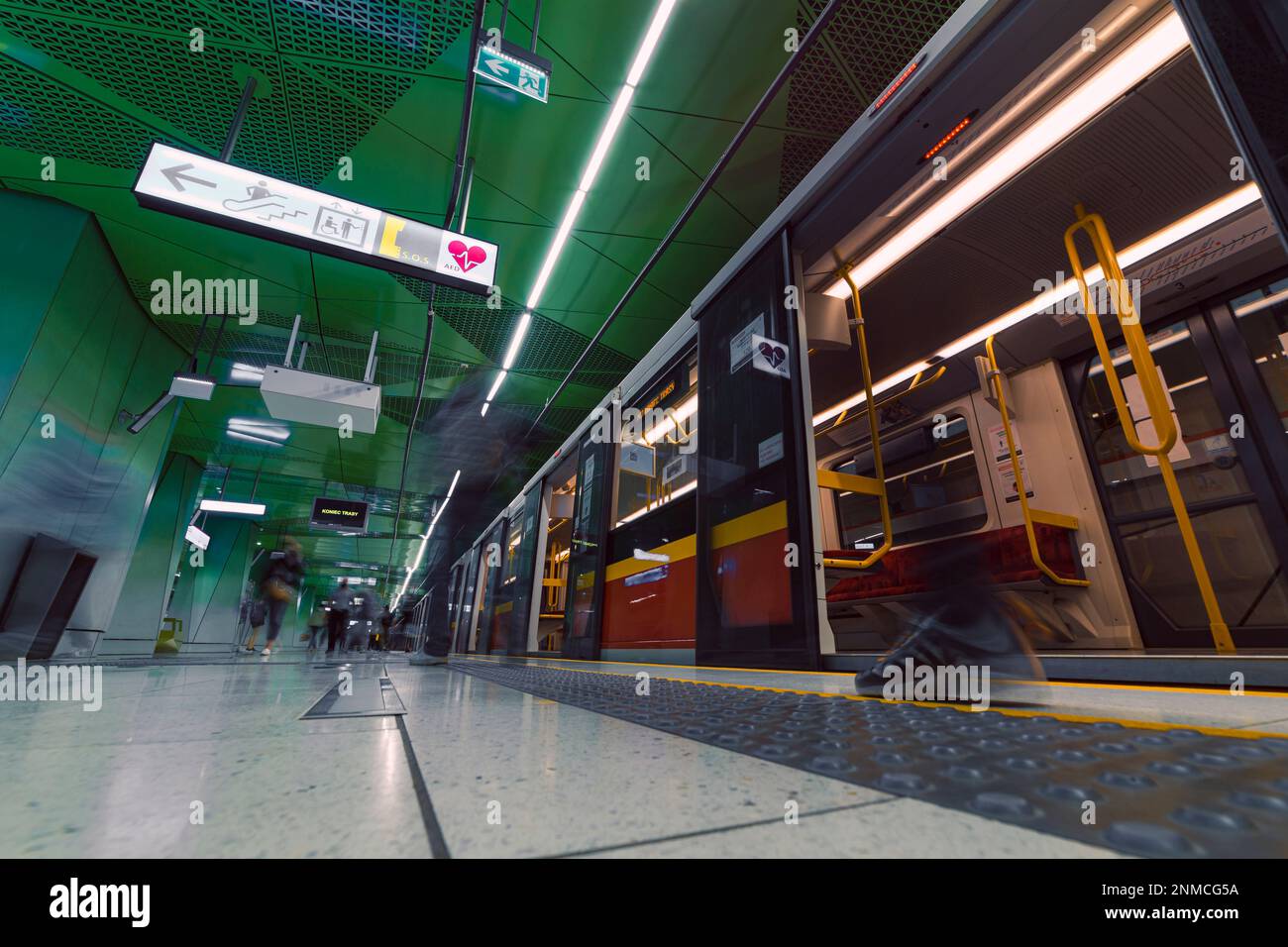 blurred figures on the subway station platform Stock Photo - Alamy