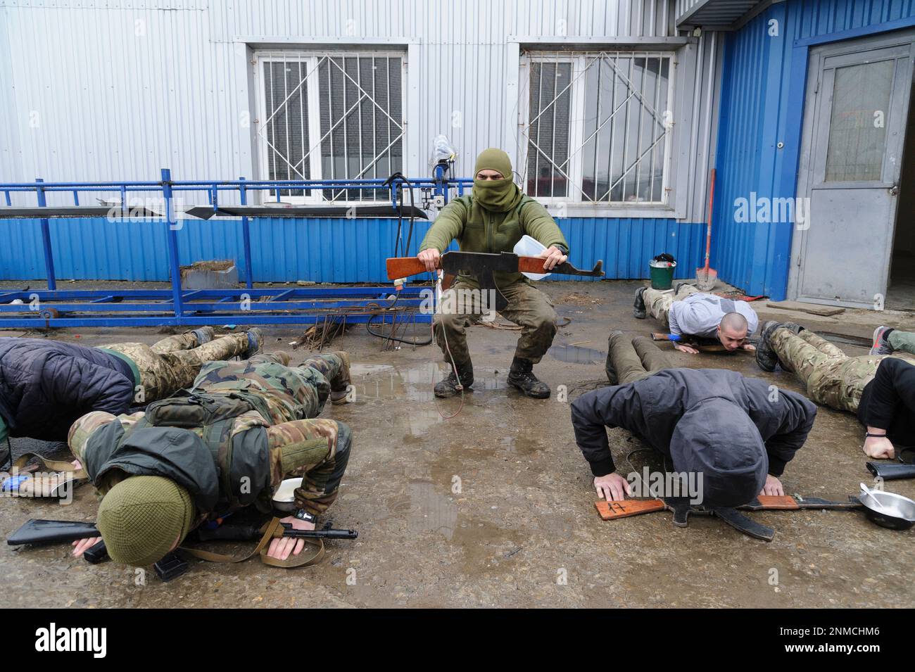 Lviv, Ukraine 24 february 2023. Civilians take part in a military ...