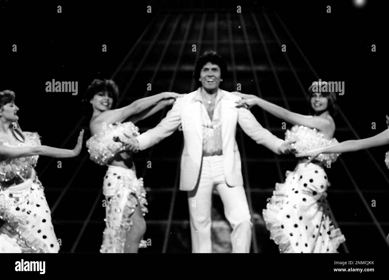 The singer Georgie Dann performing with the girls of his band in Madrid ...