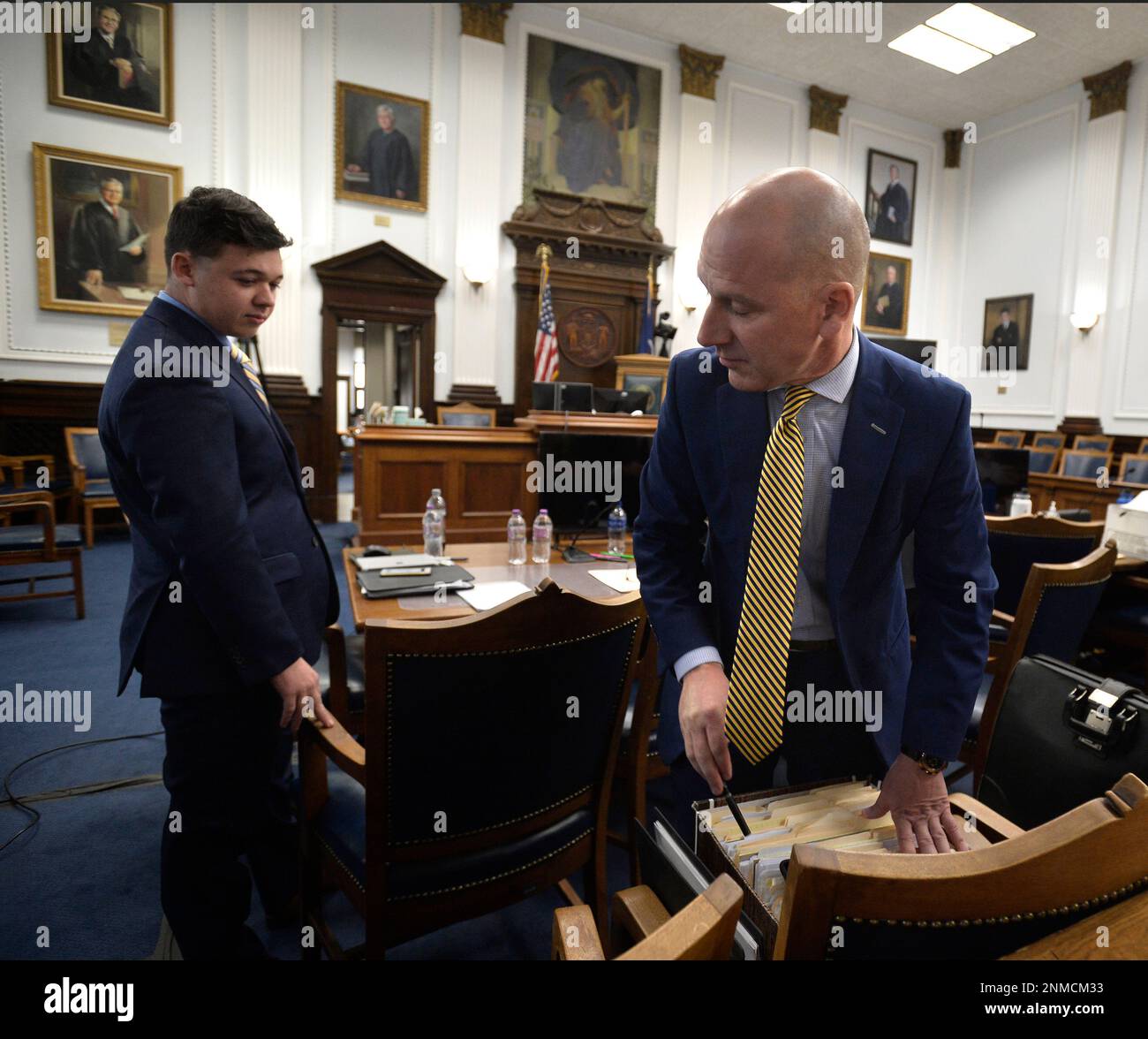 Kyle Rittenhouse, left, and his attorney, Corey Chirafisi get ready for ...