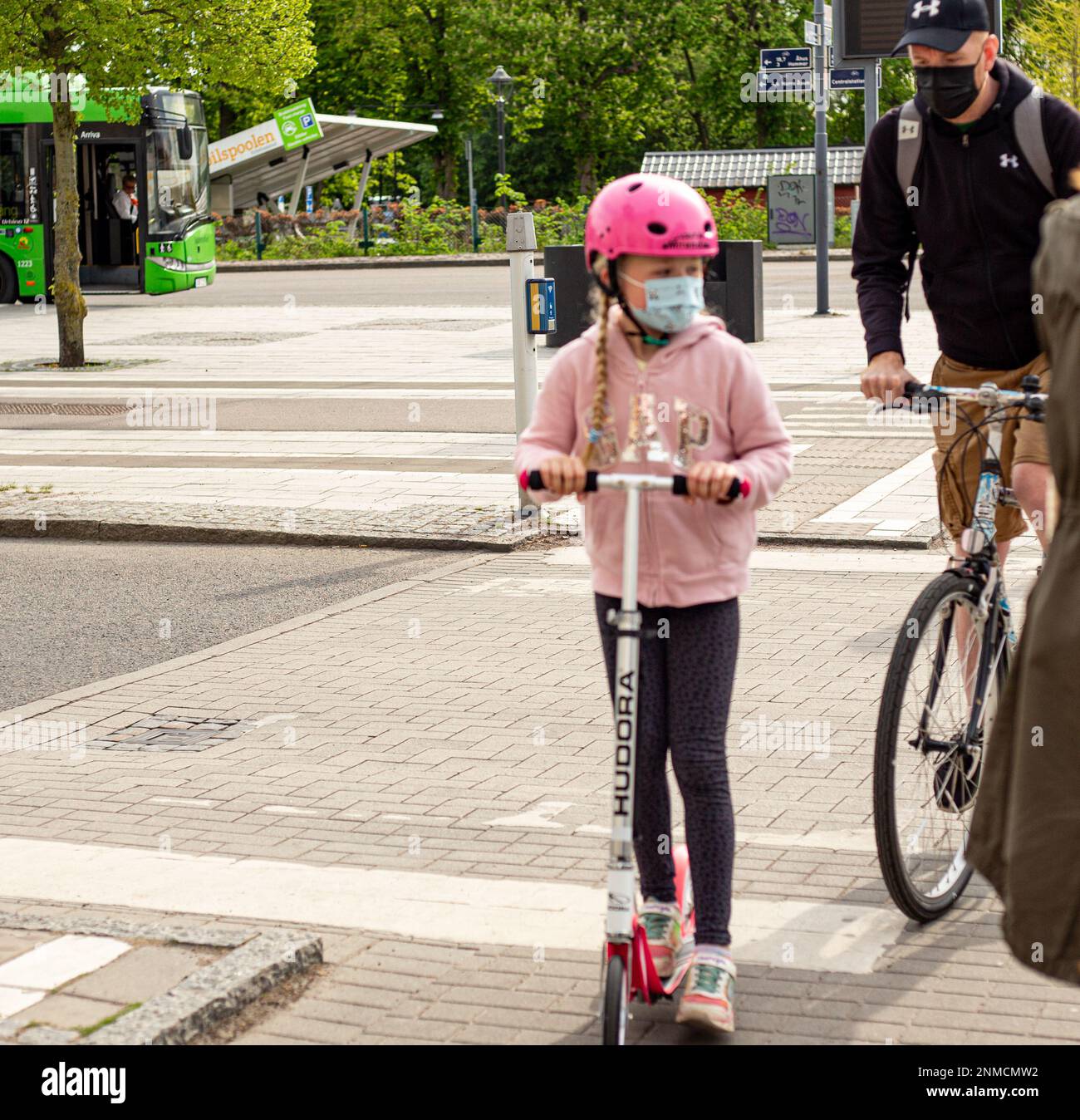 Girl and dad with moth guard Stock Photo - Alamy