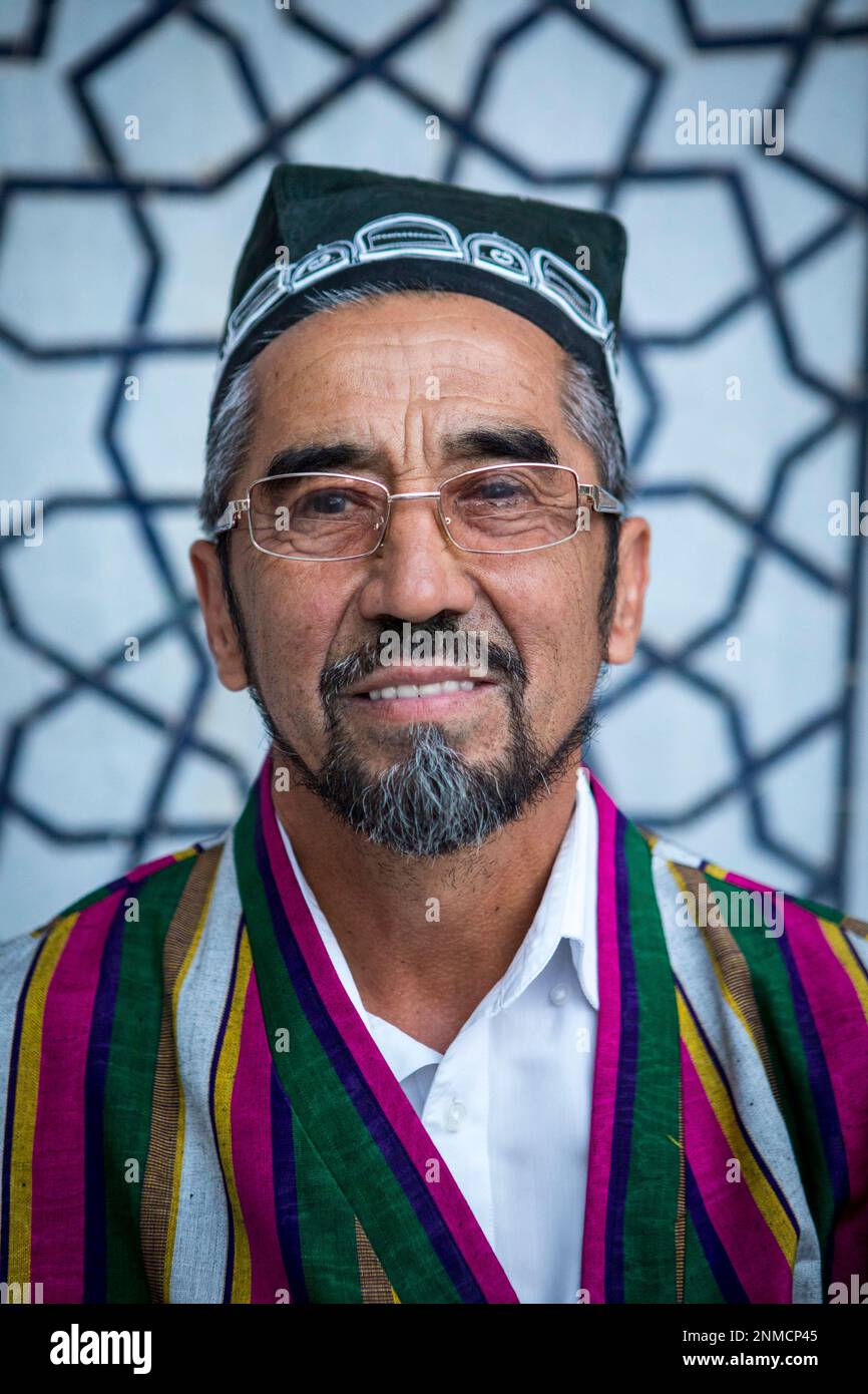 Poet, he sells his poems in the Courtyard of Ulugbek Medressa, Registan ...