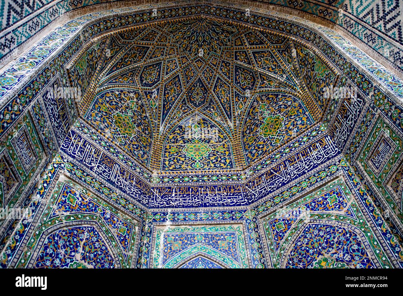 Ornamentation, detail of arc in the courtyard of Sher Dor Medressa ...