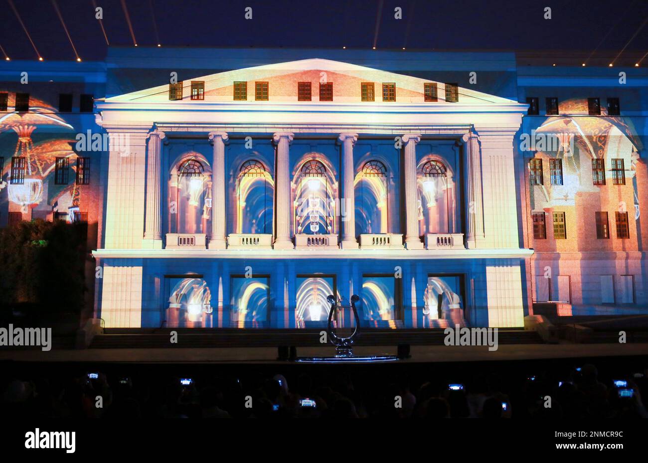 A view of a light show projected on the facade of Shanghai Concert Hall ...