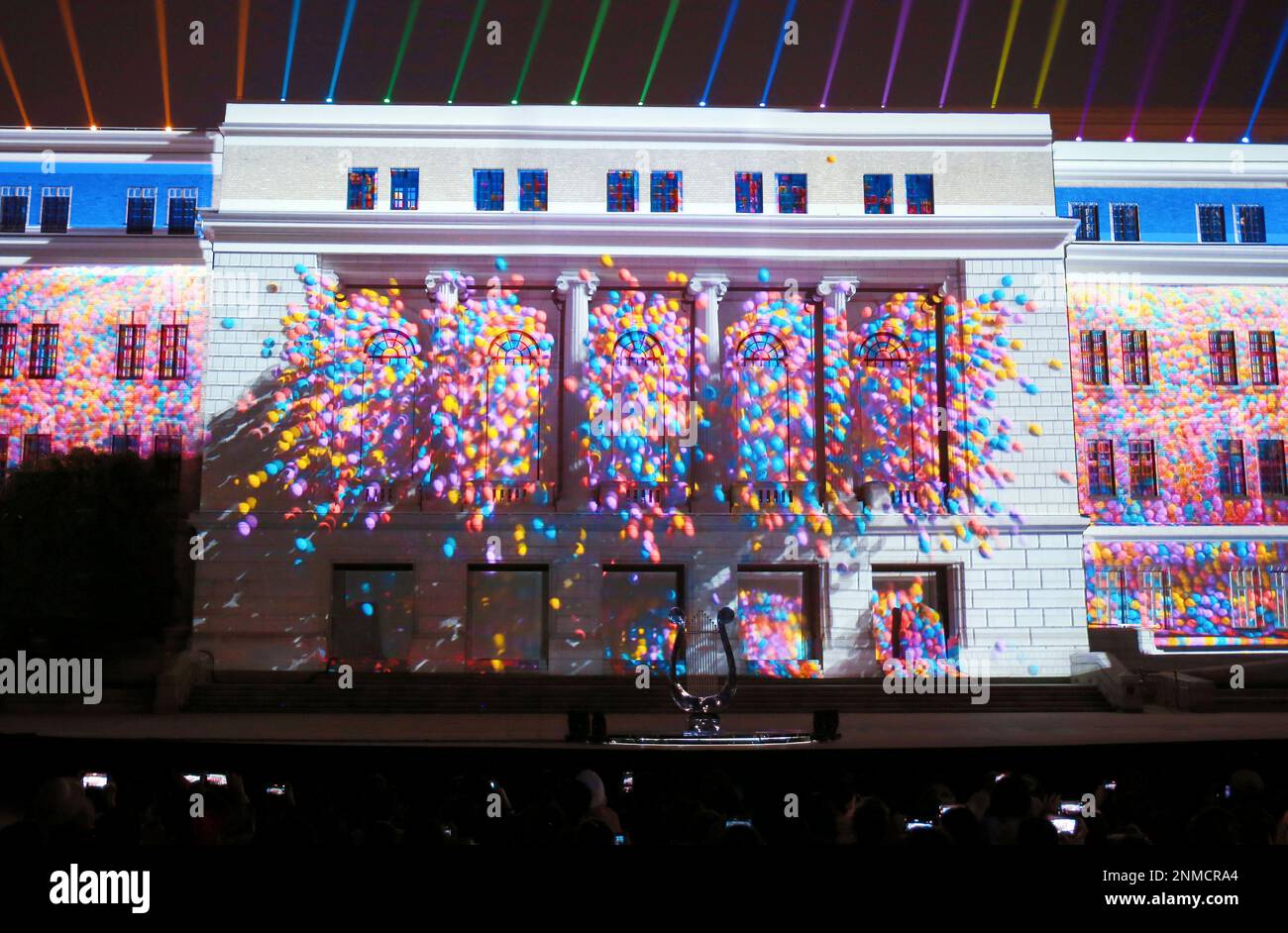 A view of a light show projected on the facade of Shanghai Concert Hall ...