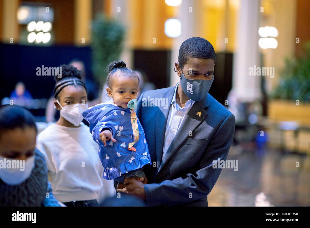 With his family by his side, Mayor Melvin Carter, holding Amila Carter ...