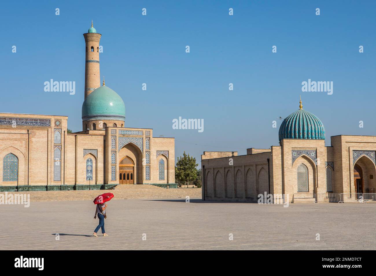 At left Hazroti Imom Friday Mosque and at right Moyie Mubarek Library ...
