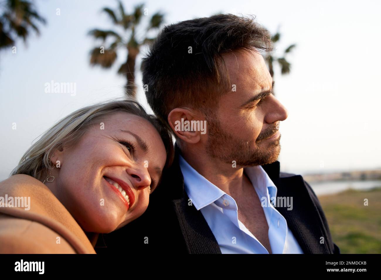 Portrait happy and relaxed couple on vacation or weekend getaway ...