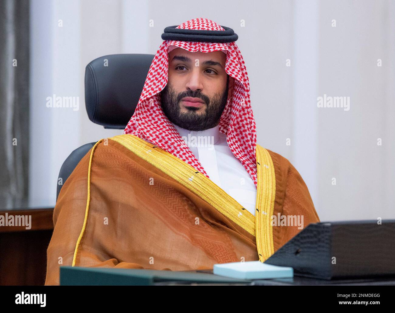 In this photo released by Saudi Royal Palace, Saudi Crown Prince ...