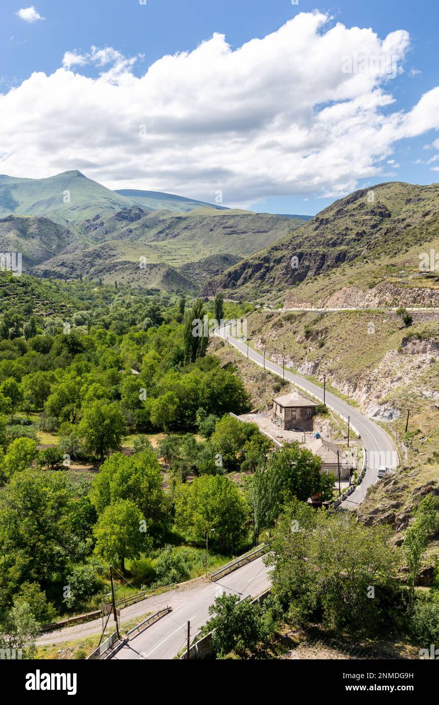 Winding tarmac road (historic silk road) through Khertvisi village in ...