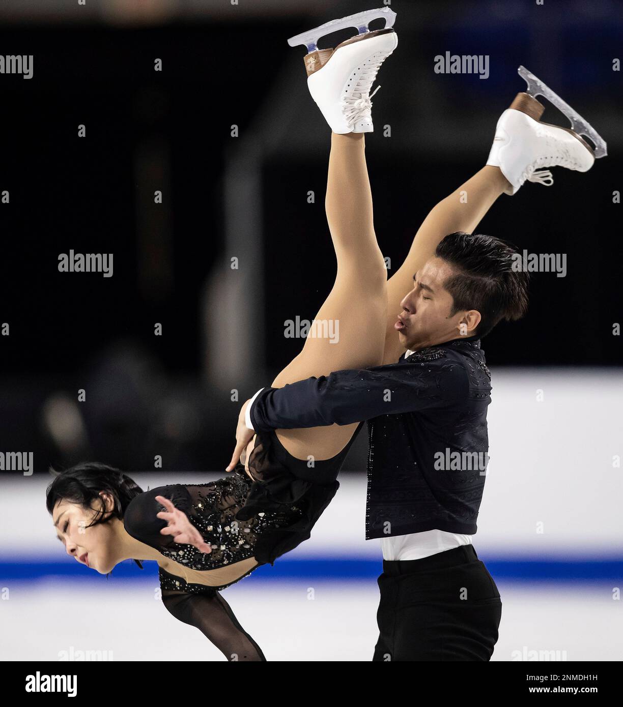 China's Sui Wenjing and Han Cong perform their pairs short program ...