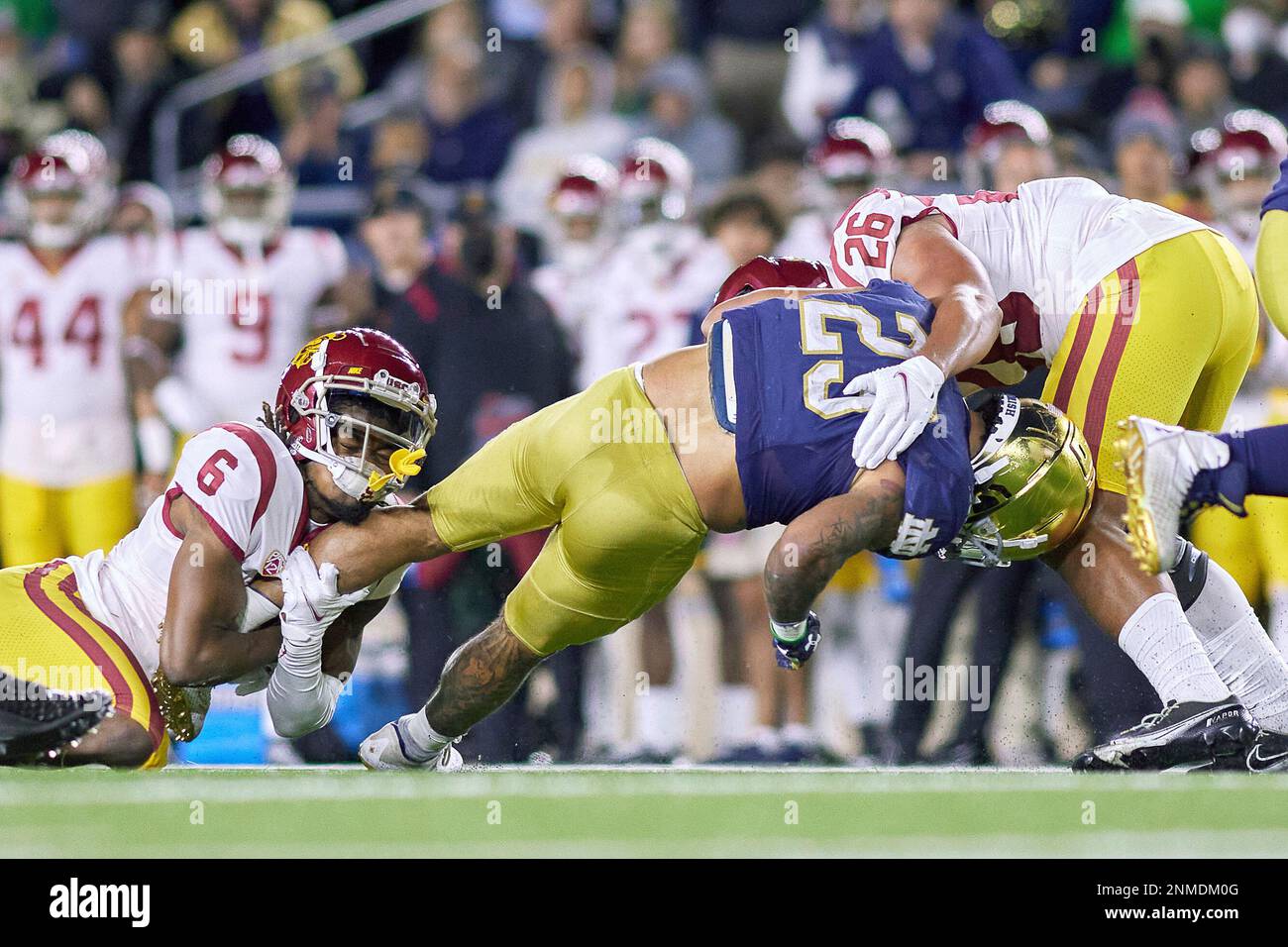 SOUTH BEND, IN - OCTOBER 23: Notre Dame Fighting Irish running back Kyren Williams (23) battles ...