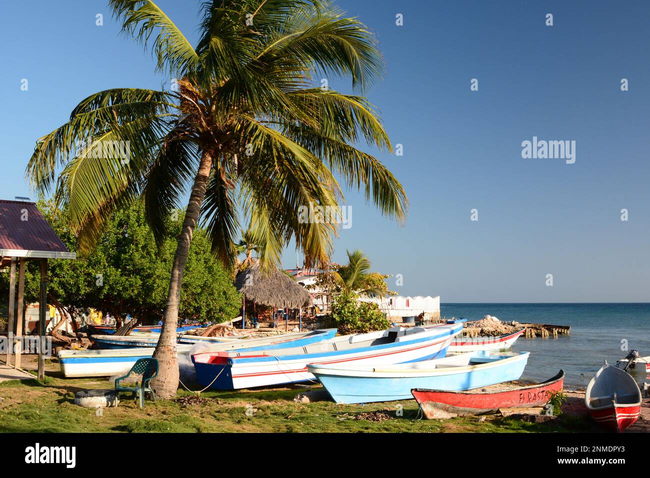 Moored boats in Puerto Caracol village. Mucura island. San Bernardo ...
