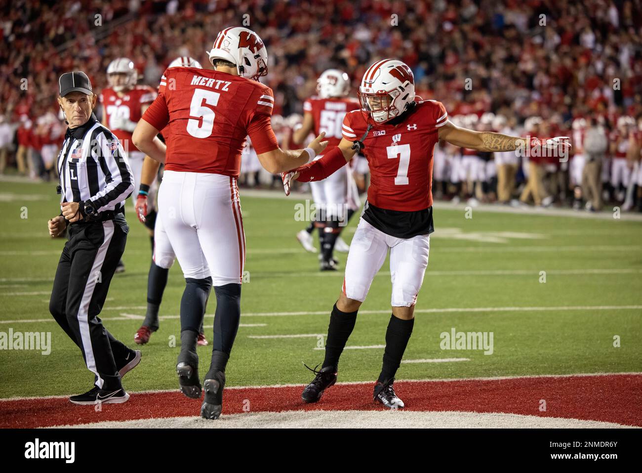 Wisconsin Badgers quarterback Graham Mertz (5) celebrates a touchdown ...