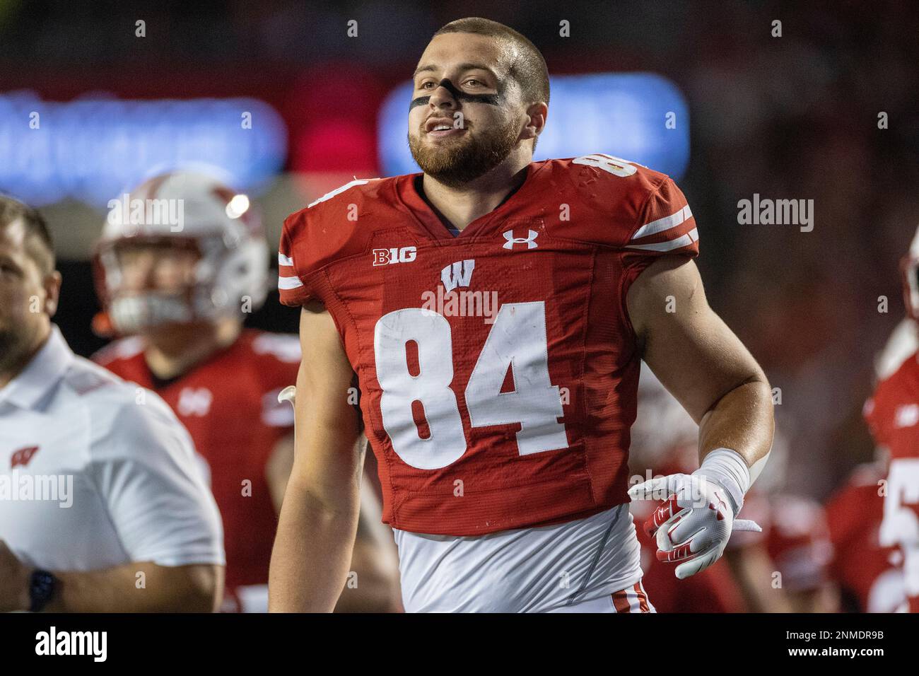 Wisconsin Badgers tight end Jake Ferguson (84) runs off the field at ...