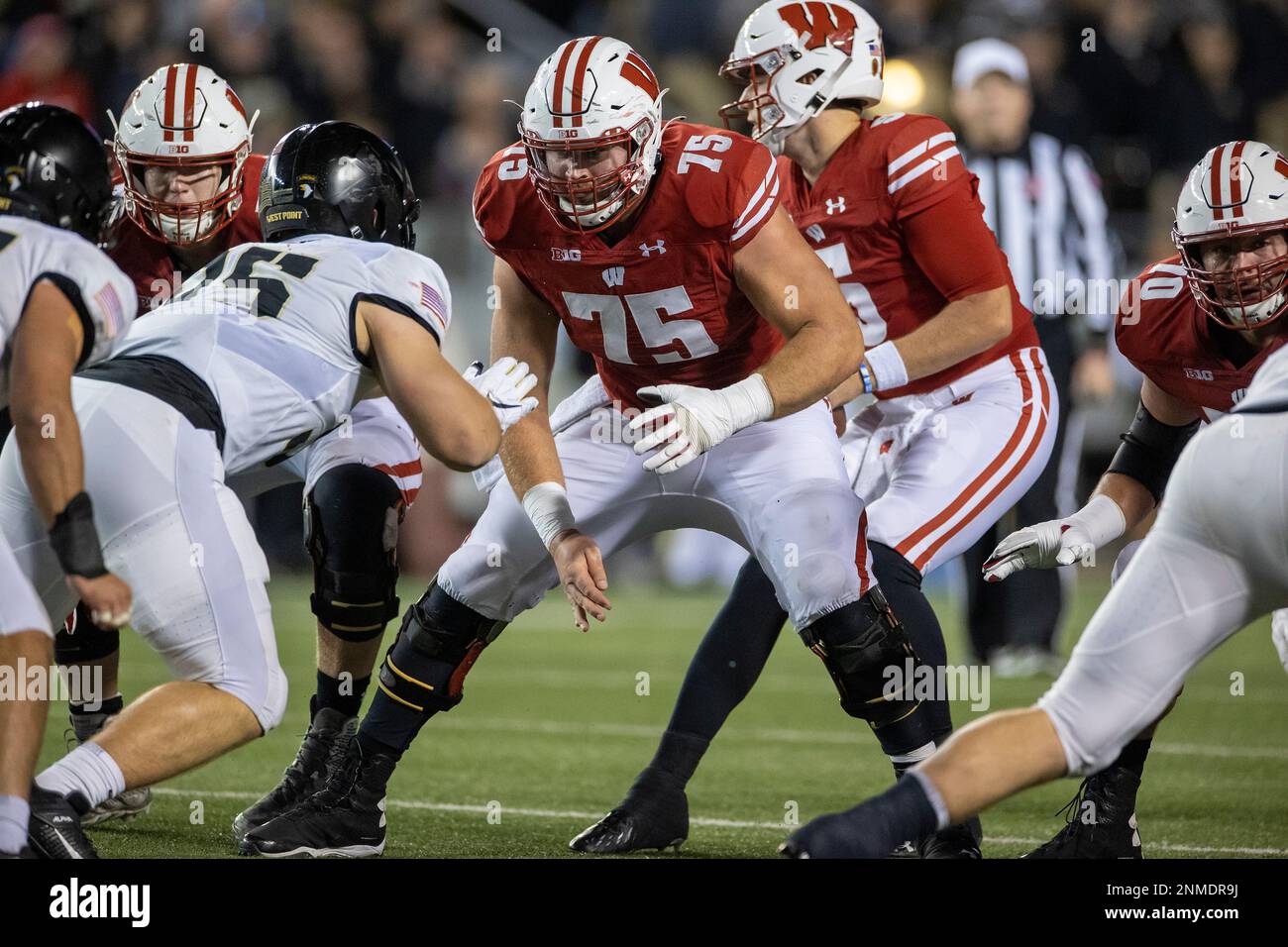 Wisconsin Badgers offensive lineman Joe Tippman (75) blocks during an ...