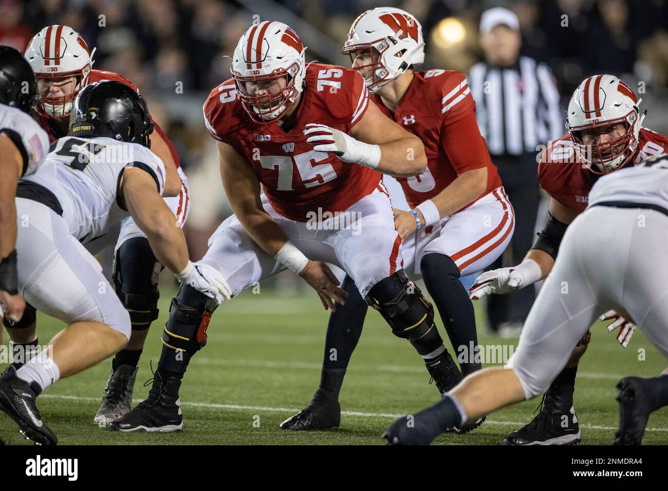 Wisconsin Badgers offensive lineman Joe Tippman (75) blocks during an ...