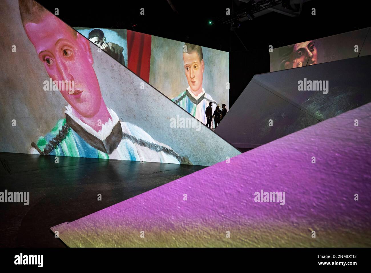People attend a preview of the Imagine Picasso immersive exhibition ...