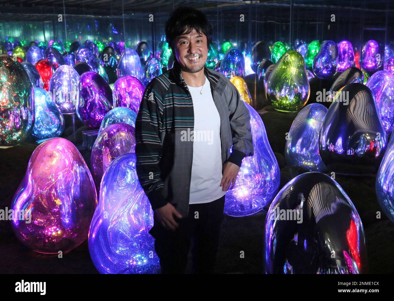 Toshiyuki Inoko poses for a photo amid an art work Moss Garden of ...