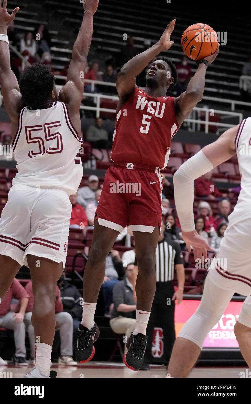 Washington State guard TJ Bamba, right, shoots against Stanford forward ...