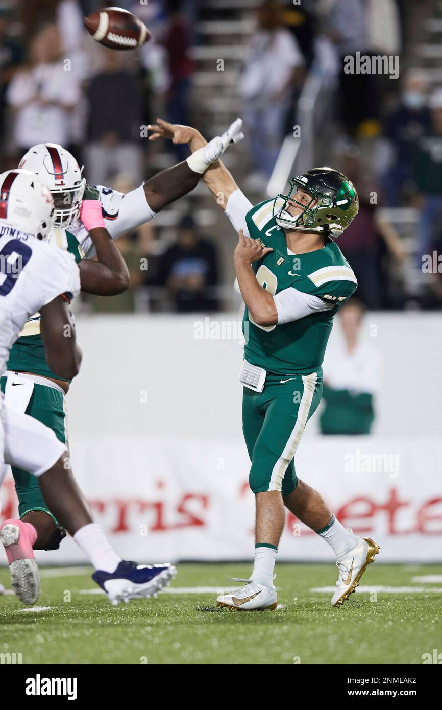 Charlotte 49ers quarterback Chris Reynolds (3) has his arm hit a he ...