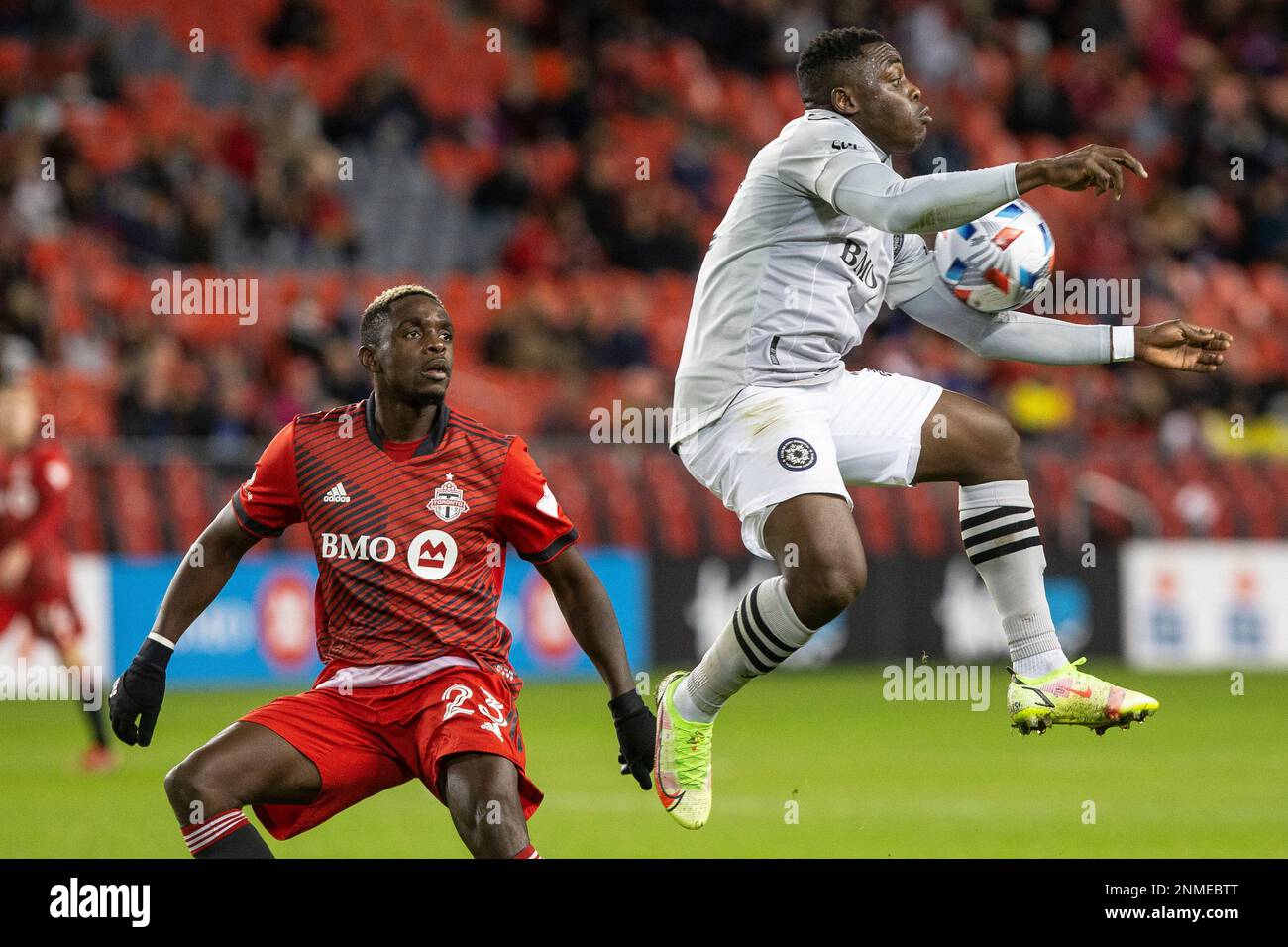 CF Montreal's Sunusi Ibrahim, right, gathers the ball in front of ...