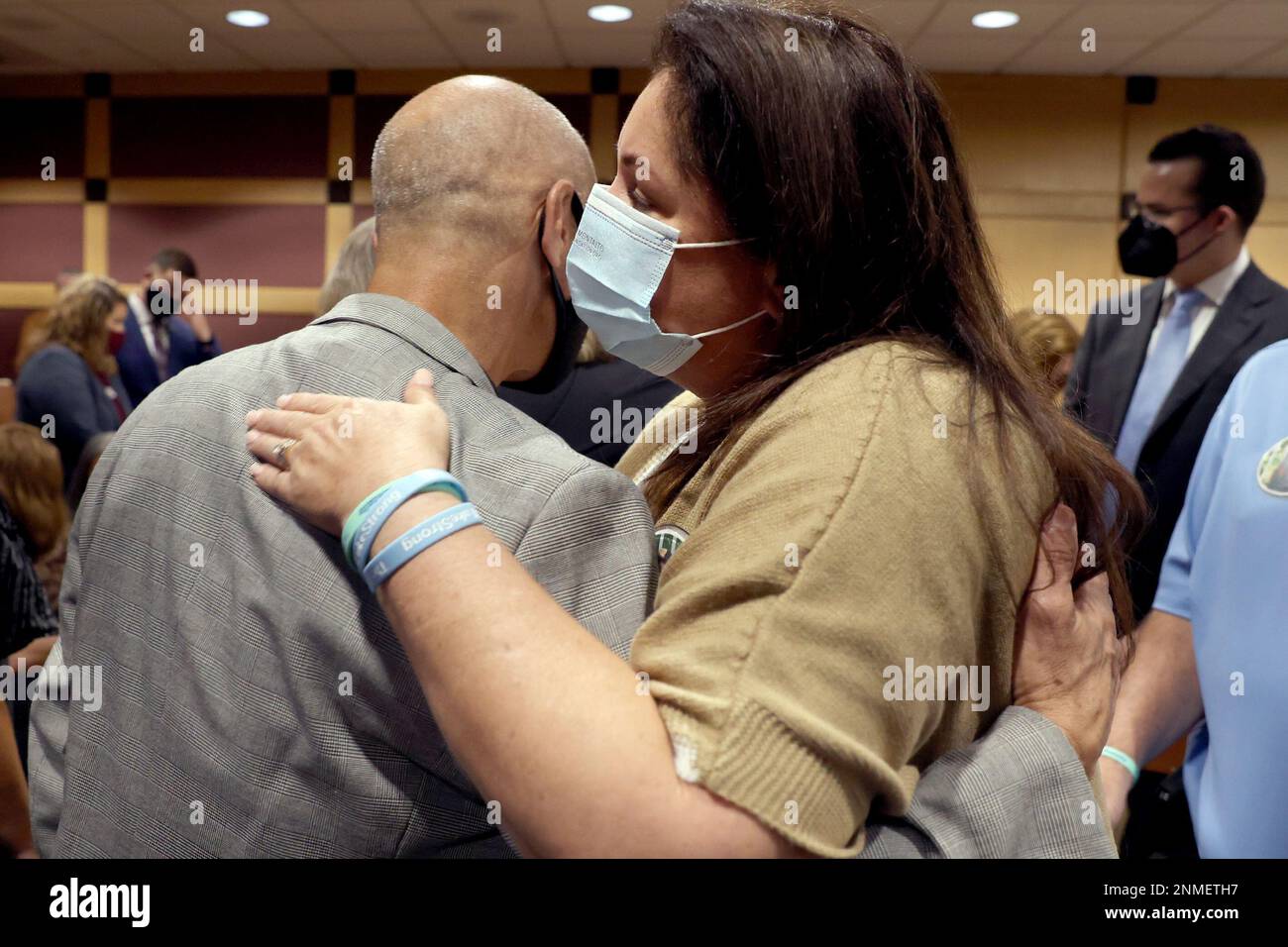 Mitch Dworet and Jennifer Montalto hug during a court recess, Wednesday ...